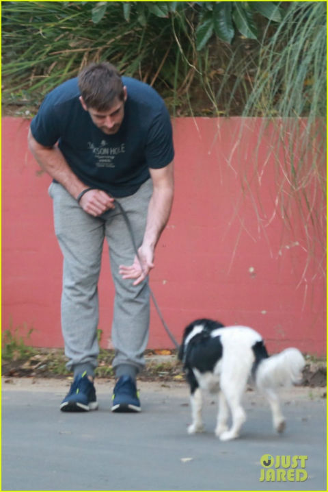 Just Aaron Rodgers Walking the Dog